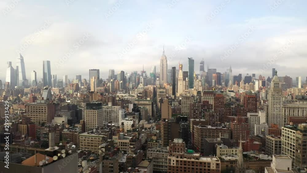 NYC aerial moving side across Cooper Square and Union Square Manhattan ...