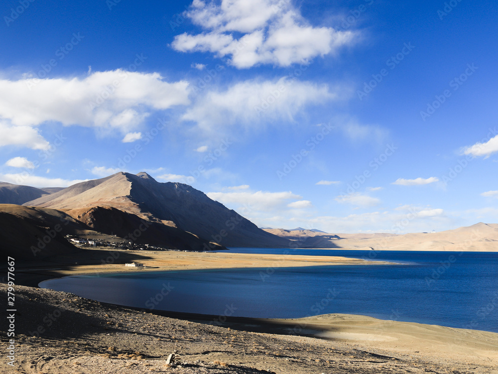 the beautiful scenery of Pangon Lake with mountain and bright cloudy ...