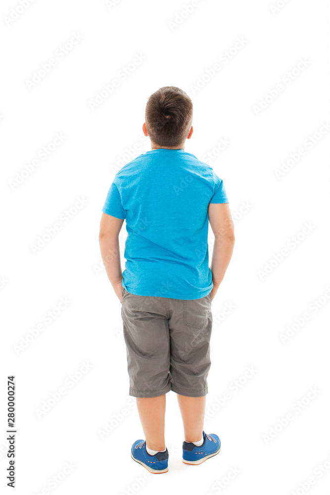 Adorable little boy looking at wall. Rear view, Isolated on white ...