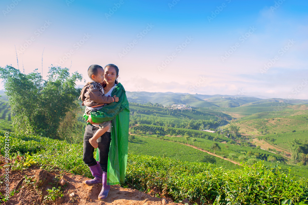 Neighborhood Dadugangxiang village of Yunnan province in China. Mother ...