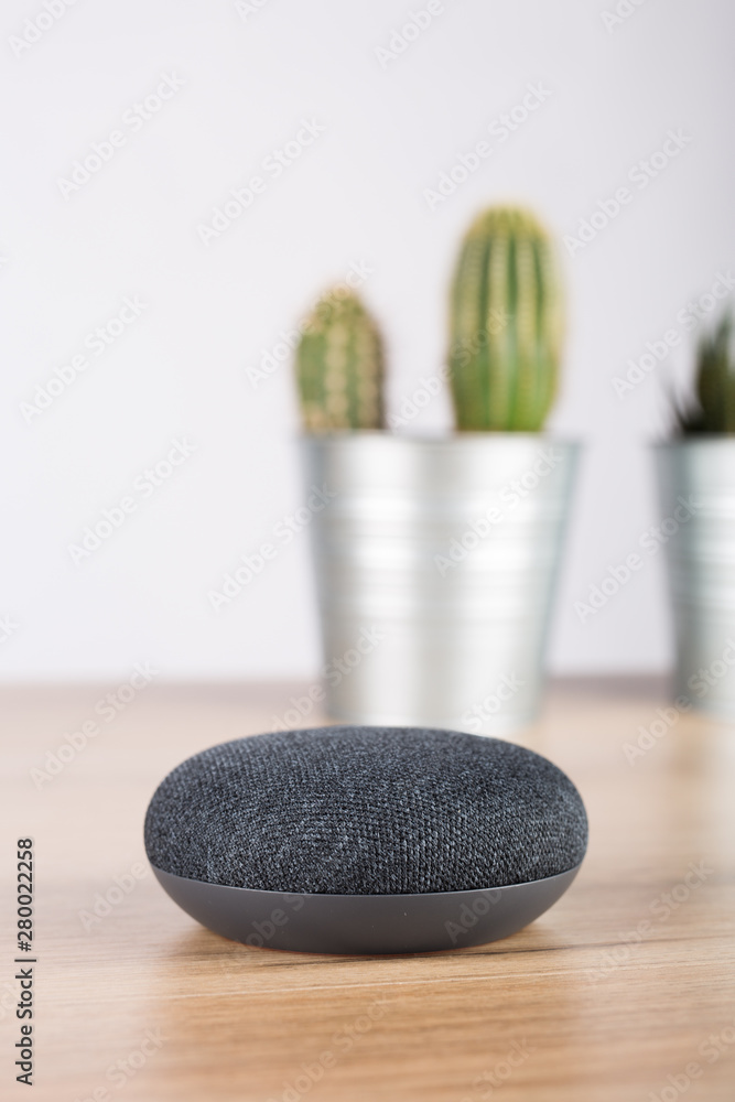 digital voice assistant with wood background Stock Photo | Adobe Stock