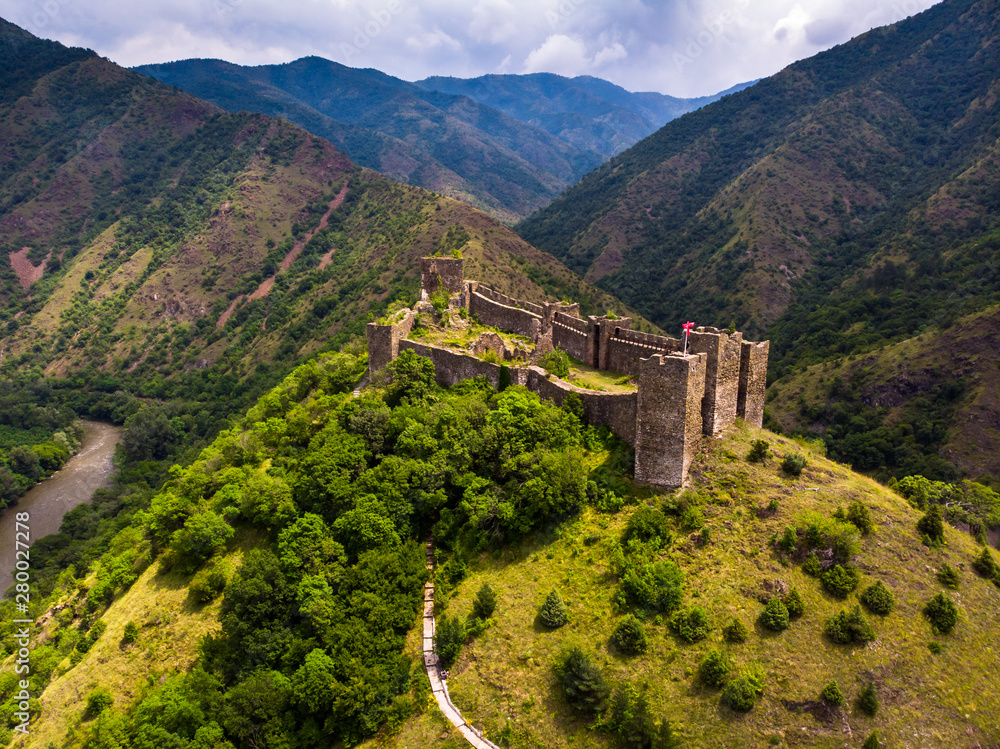 Ruins of medieval fortress Maglic on top of hill by the Ibar river in ...