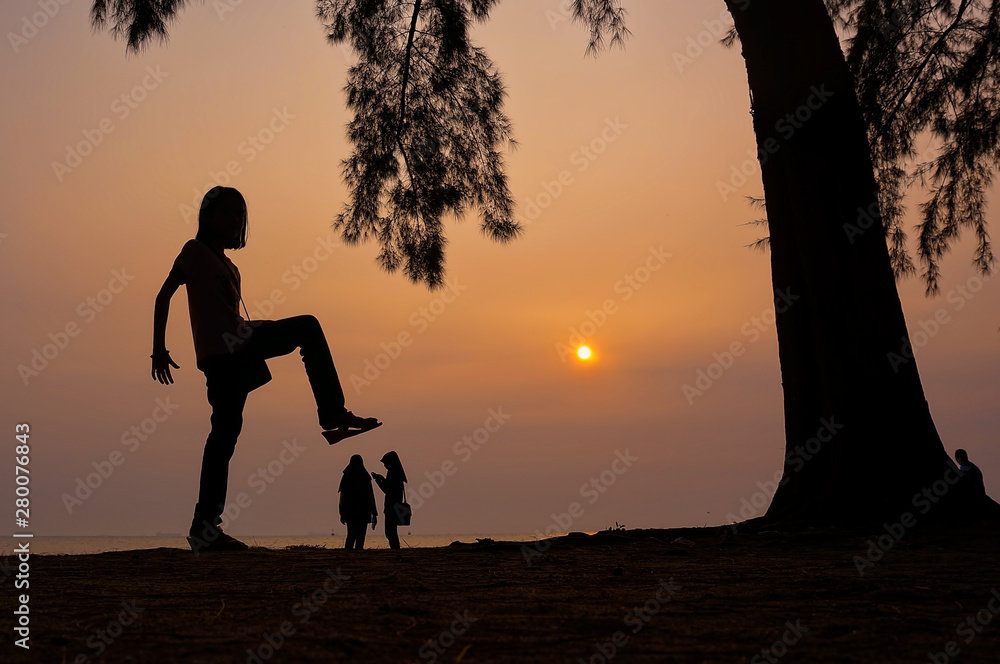 Giant Girl Kids Trampling People near the beach Stock Photo | Adobe Stock