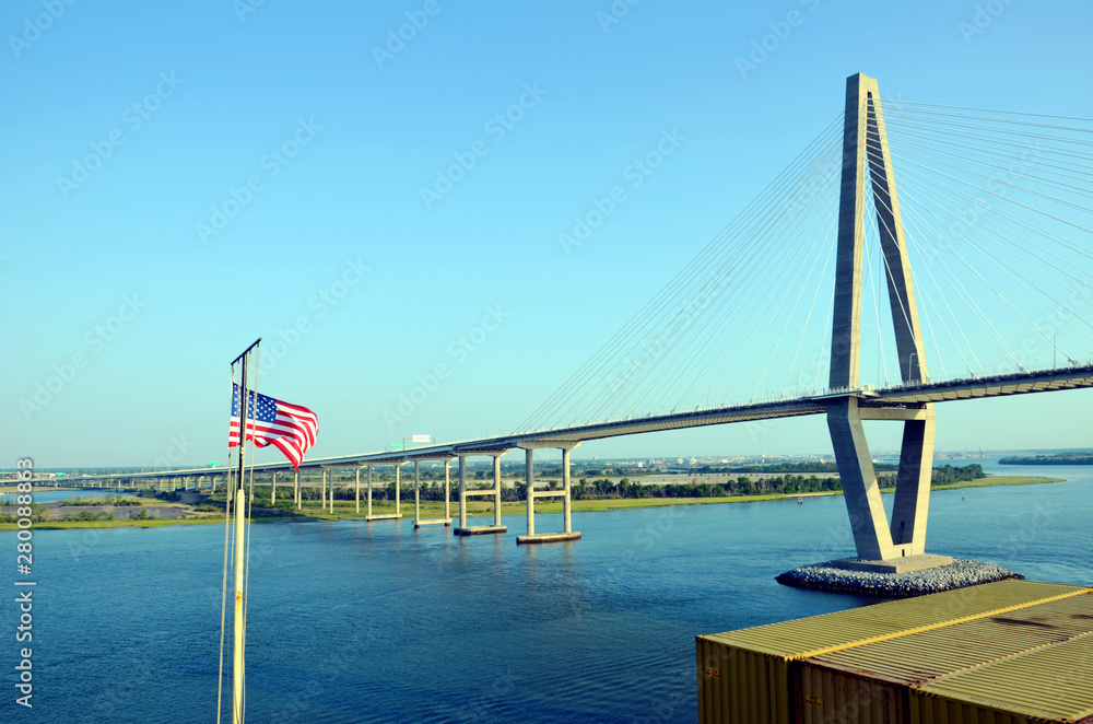 Container ship sailing under the Arthur Ravenel Jr. Bridge in ...