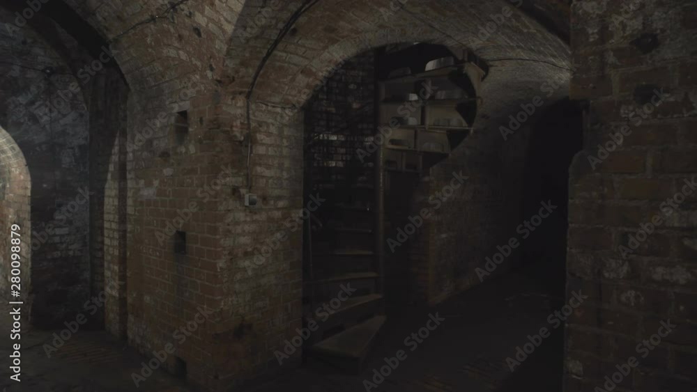 A ghost of a woman with a rusty cage on his head and with shackles on ...