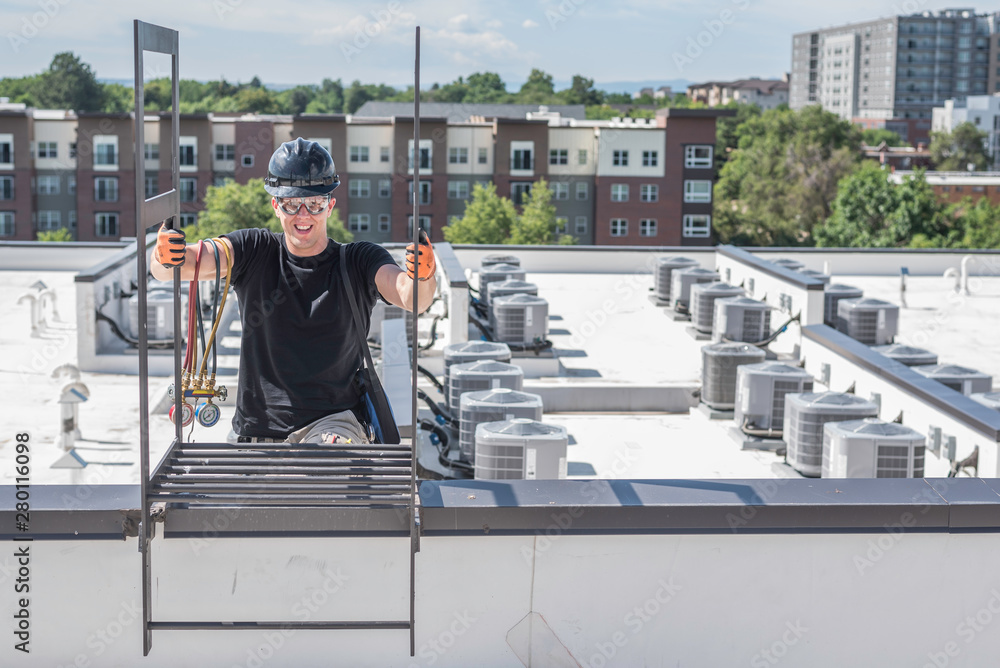 Hvac Tech on Roof Ladder Stock Photo | Adobe Stock