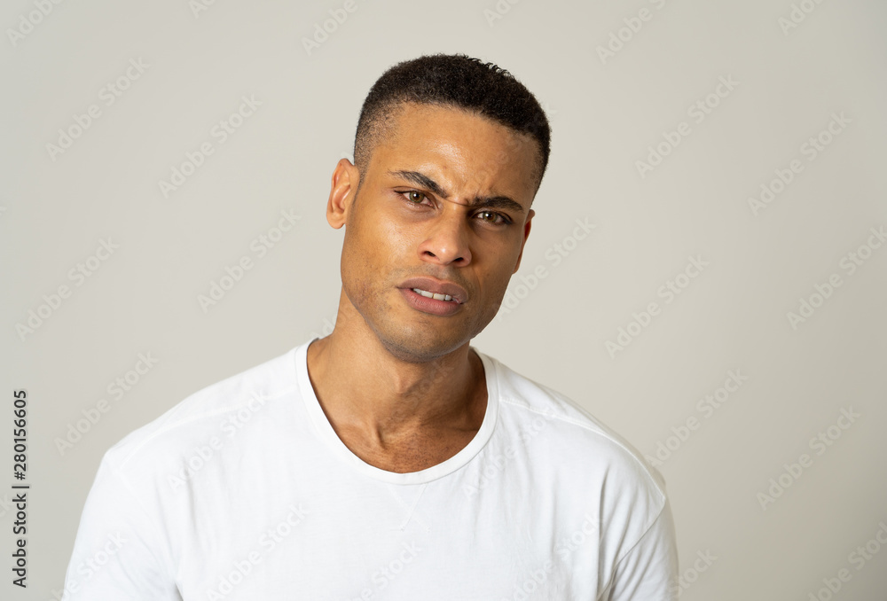 Human expressions and emotions. Young attractive man with an angry face ...