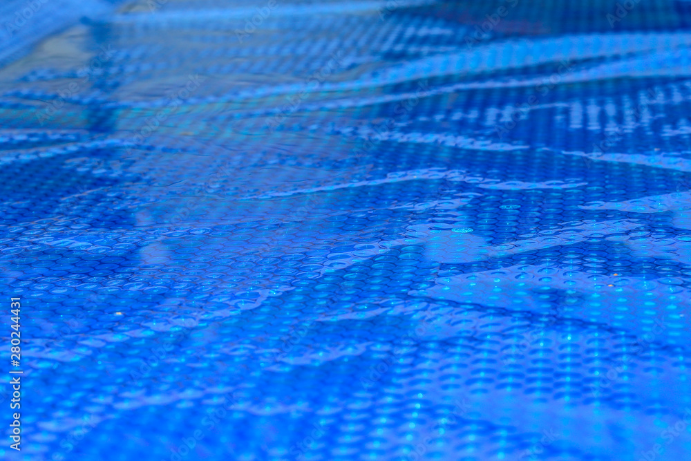 Blue cyan abstract background. Close up of blue bubble plastic used as ...