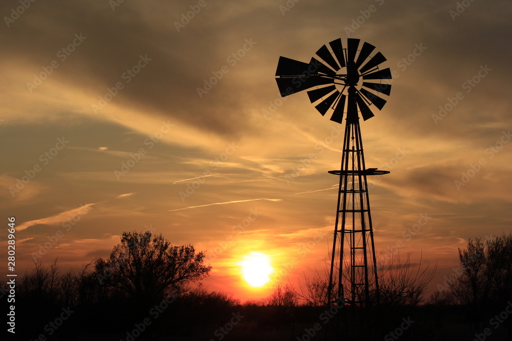 Kansas Windmill Silhouette at Sunset with clouds Stock Photo | Adobe Stock