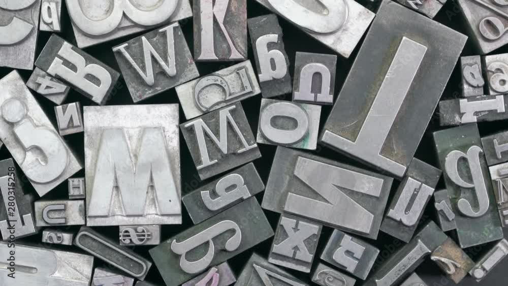 Letters, numbers and other symbols in letterpress metal type - top view ...