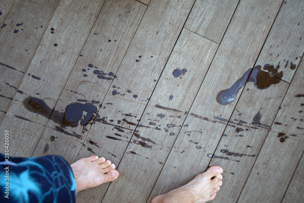 Bare feet and wet footprints on the floor Stock Photo | Adobe Stock