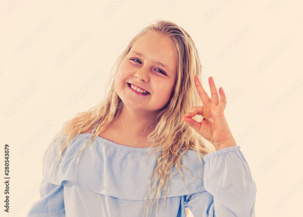Cute pretty girl with happy face and ok sign gesture. In human emotions ...