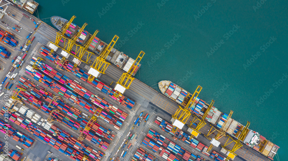 Aerial view cargo ship terminal, Unloading crane of cargo ship terminal ... Aerial view cargo ship terminal, Unloading crane of cargo ship terminal ...