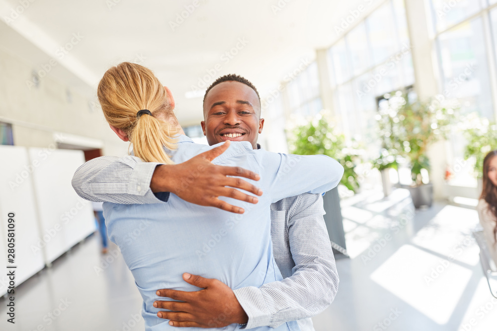 Students hug each other after diploma completion Stock Photo | Adobe Stock