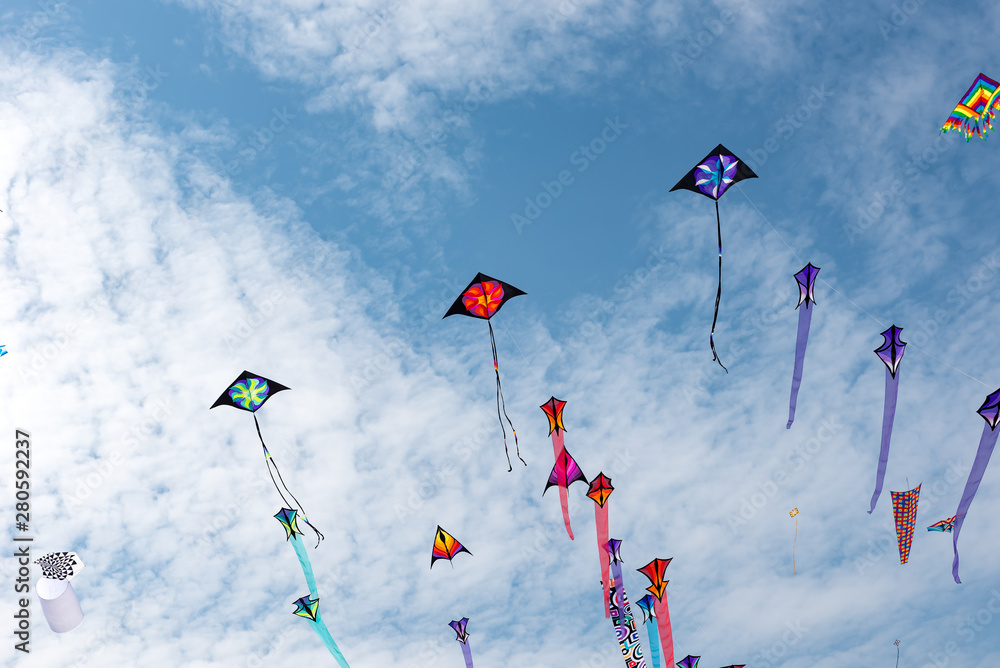 Kites with blue sky and white clouds Stock Photo | Adobe Stock