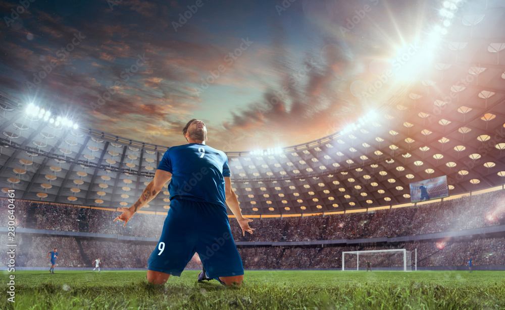Soccer players in action on professional stadium on sunset. Stock Photo ...