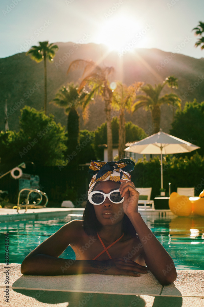 Cool Young Stylish Black Woman Posing in Swimming Pool at Sunset Stock ...