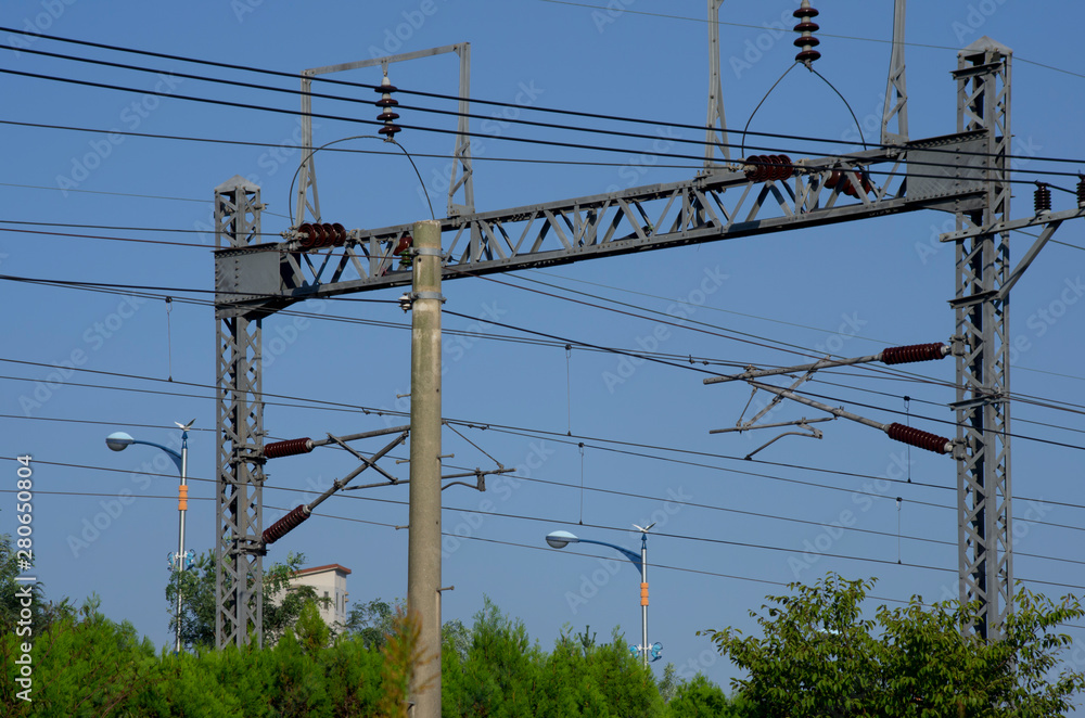 high voltage power lines on rail road Stock Photo | Adobe Stock