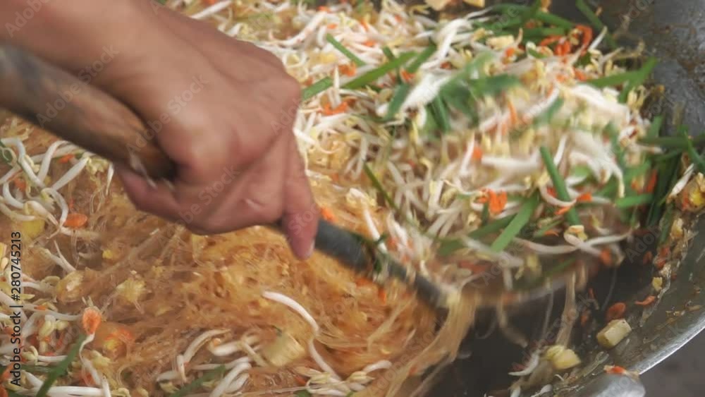 Asian Street food: Chef Cooking Pad Thai, Street food : thai man is ...