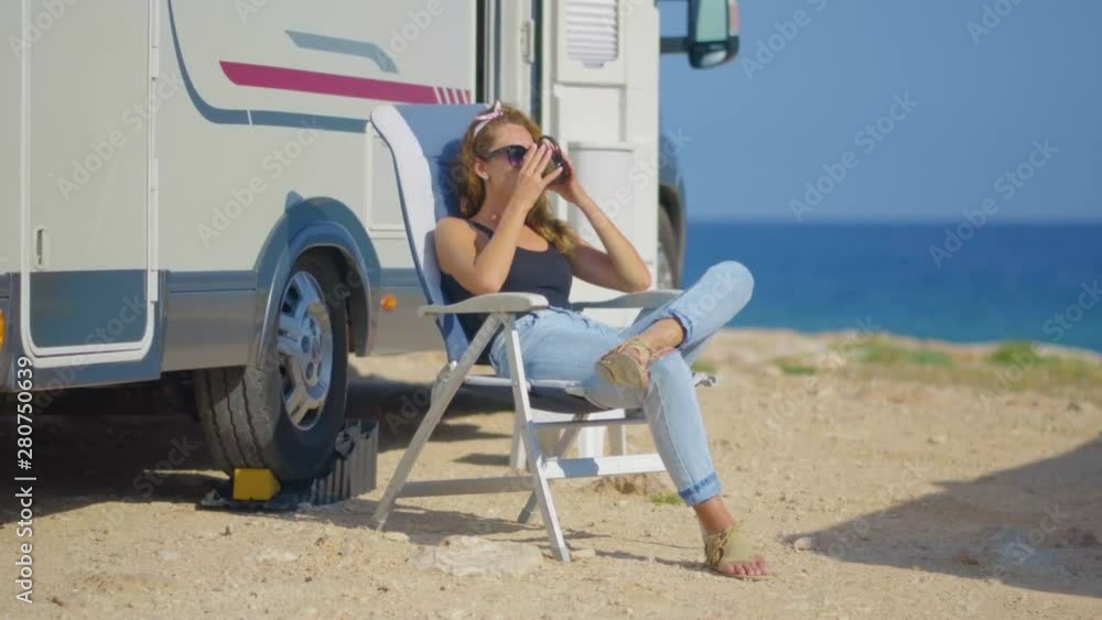Travel in motorhome. Traveling woman by mobile motor home RV campervan ...