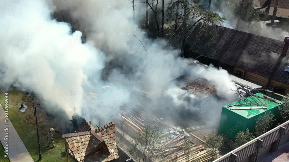 Brave firemen inside burning building. Fire extinguishing, fire brigade ...