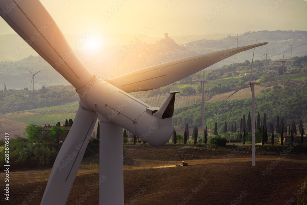 Wind turbine farm power generator in beautiful nature landscape for ...