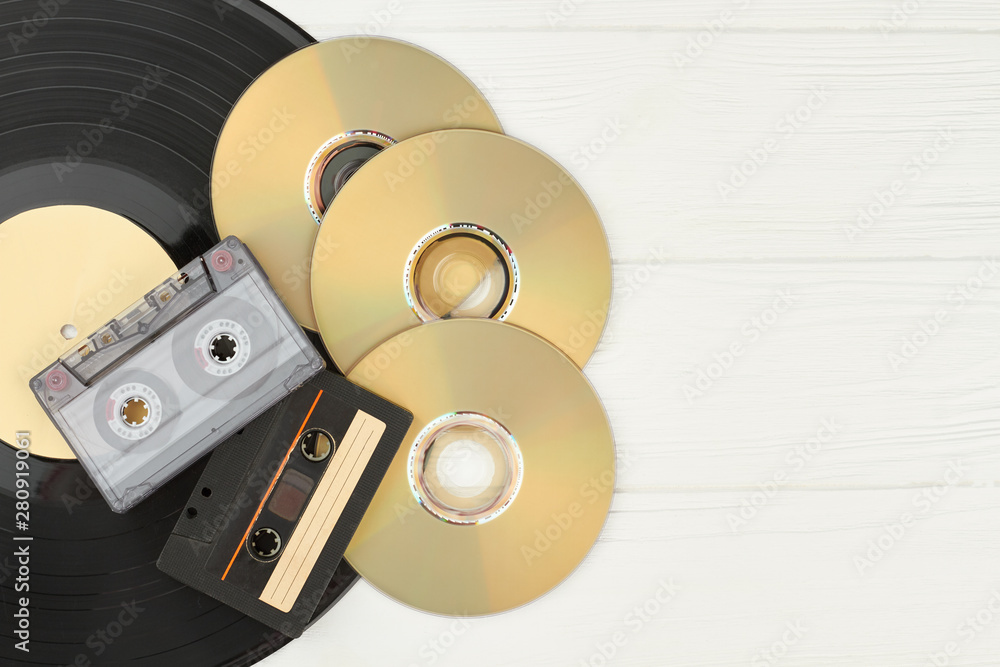 Vinyl record, tape cassettes and compact discs. DVD discs, audio ...