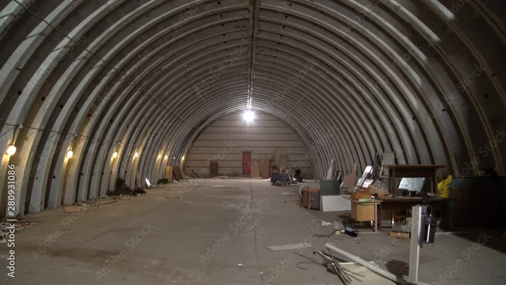 Abandoned empty warehouse, old rustic metal structure with metal ...