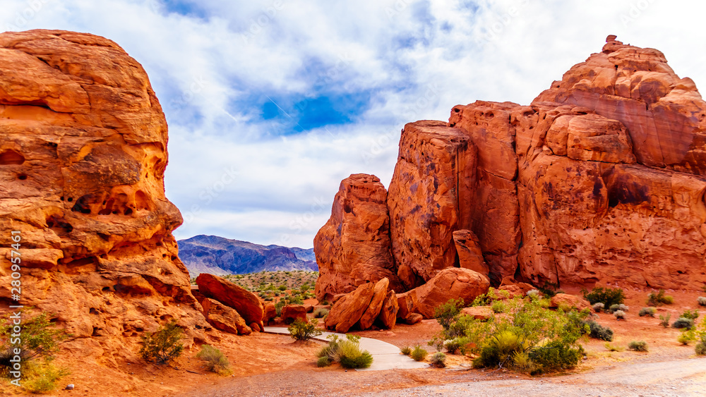 The Seven Sisters, a bright red Aztec sandstone rock formation in the ...
