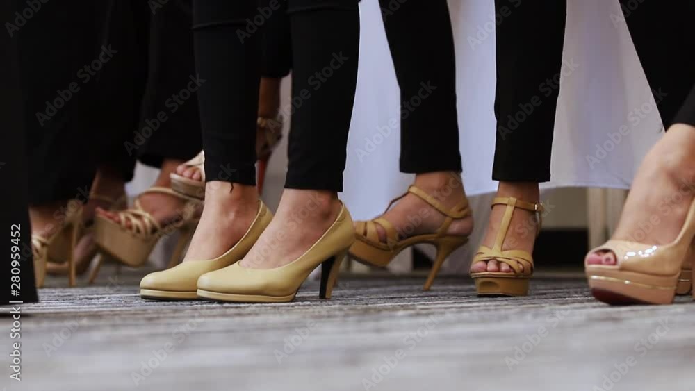 Group Women practice fashion catwalk or walk like a model with ...