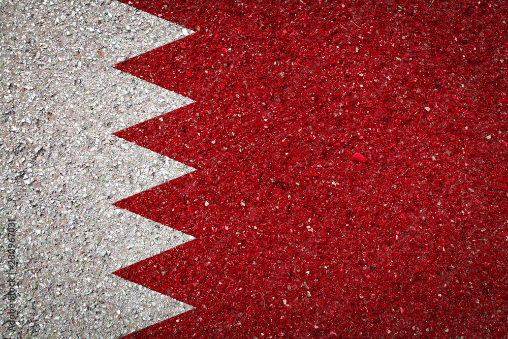 National flag of Bahrain on a stone background.The concept of national ...