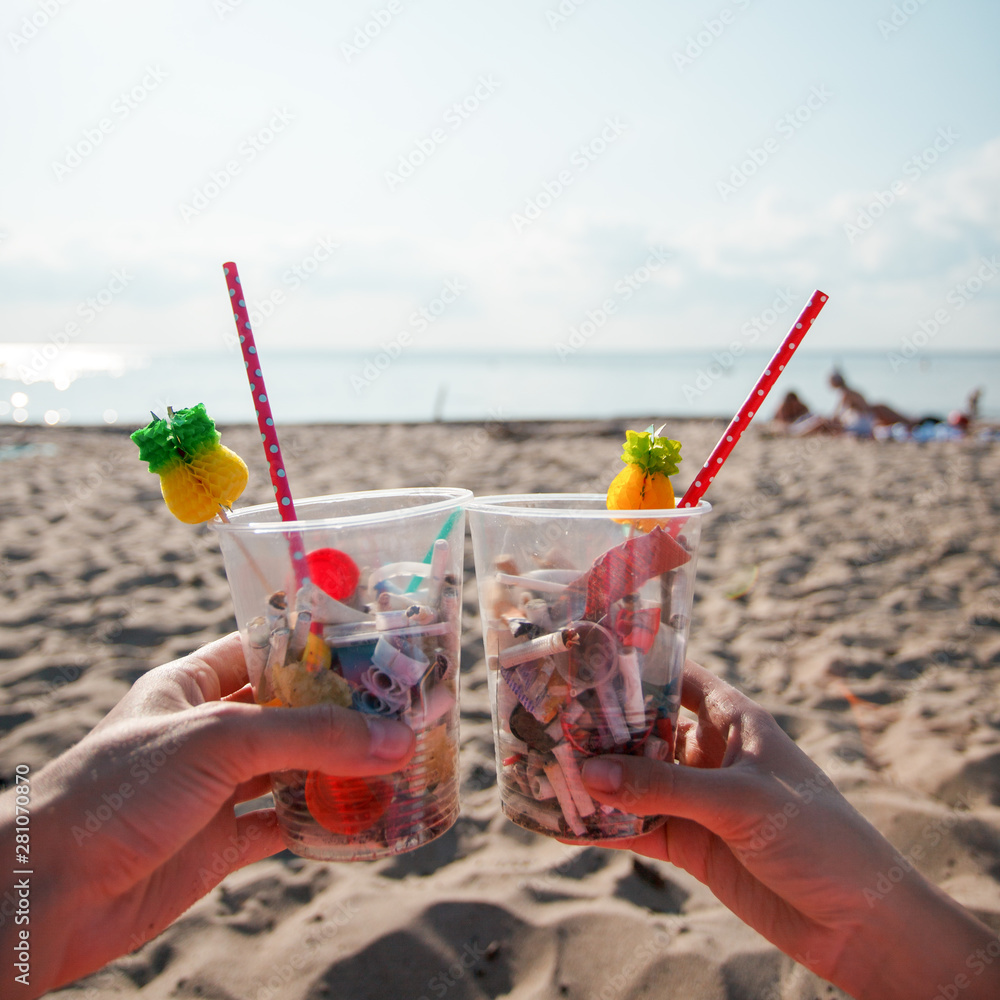 Plastic pollution in ocean environmental problem, hands holding plastic ...
