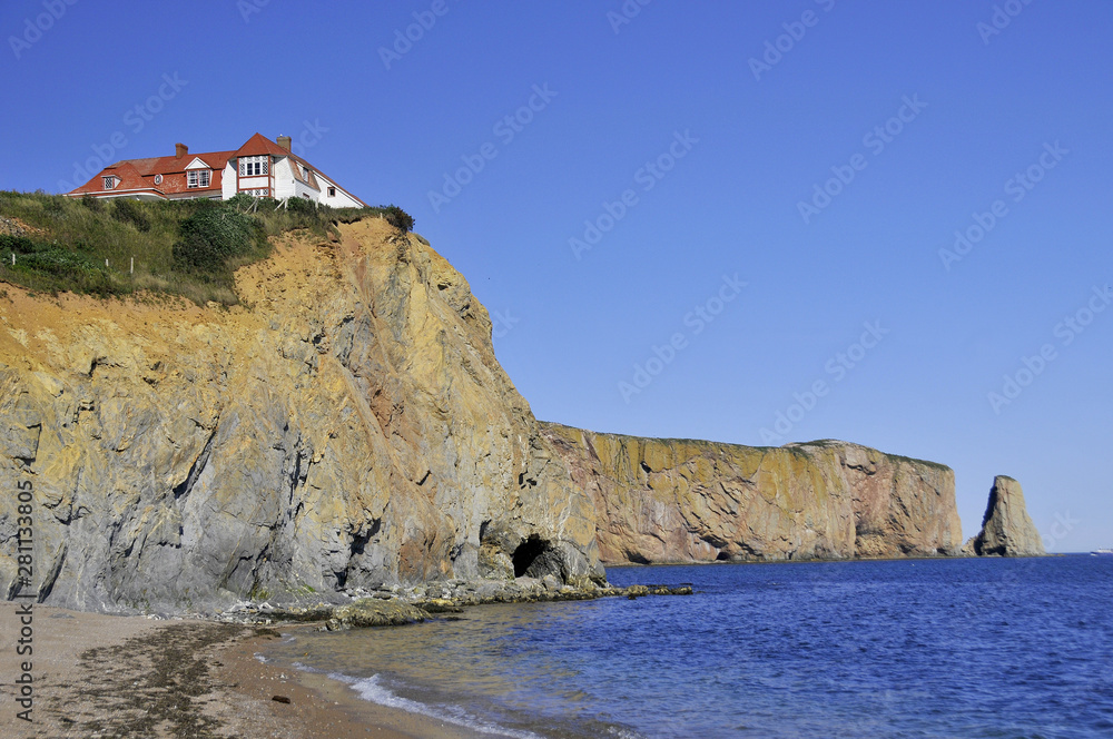 Perce Rock (French rocher Perce, "pierced rock") is a huge sheer rock ...