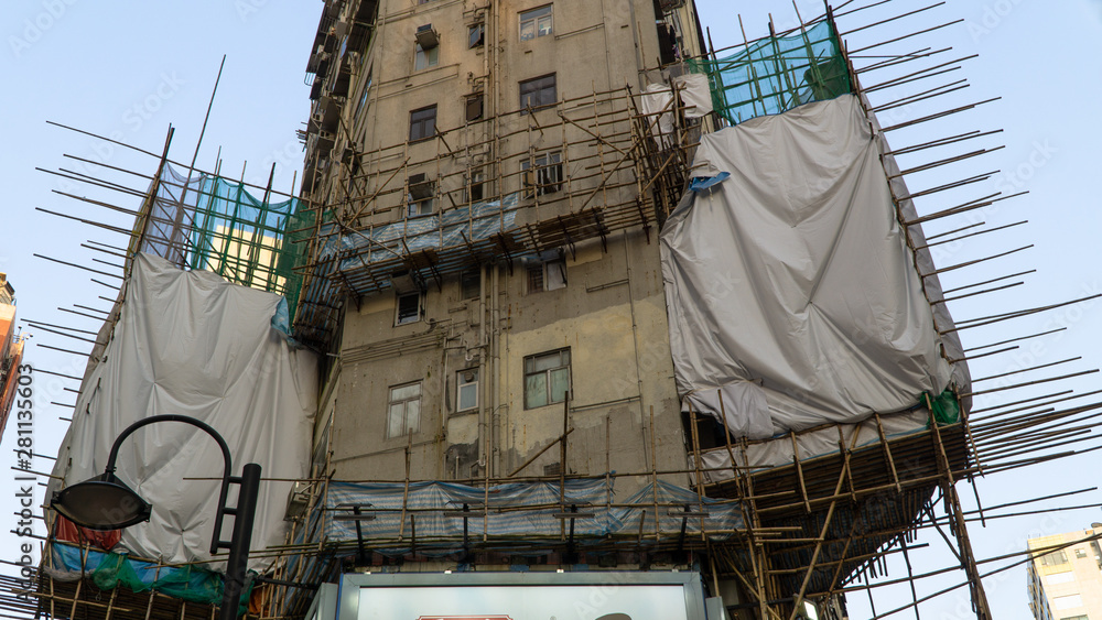 Traditional bamboo scaffolding frame at the corner of the old public ...