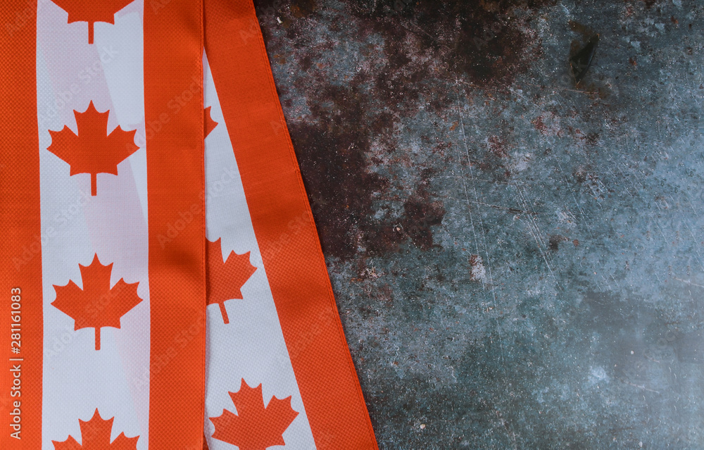 Canadian red and white flag against dark rustic background for Canada ...