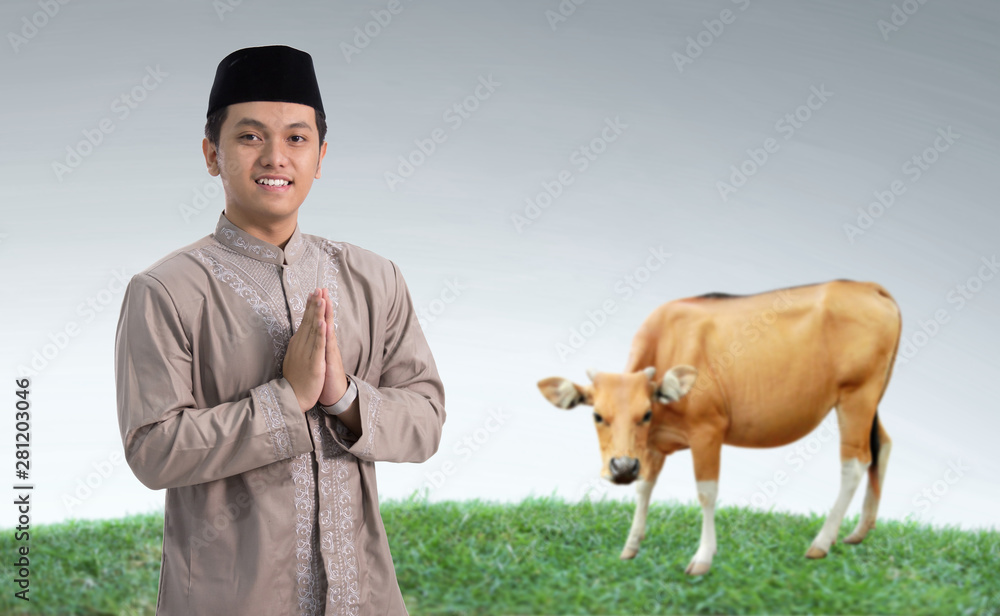 portrait of muslim man with cow for idul adha qurban celebration Stock ...