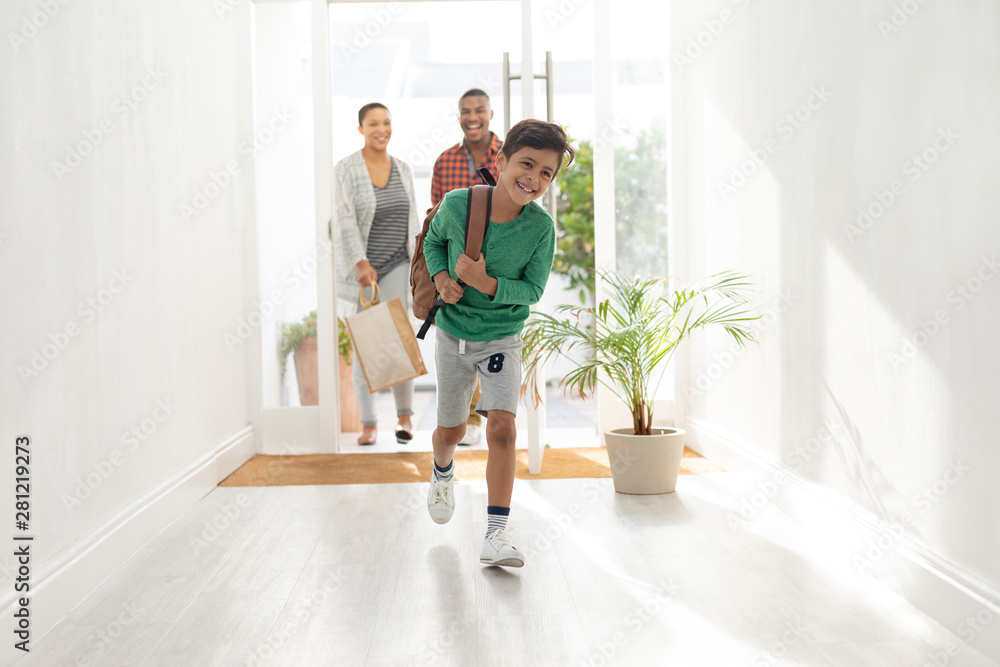 Family entering their house Stock Photo | Adobe Stock