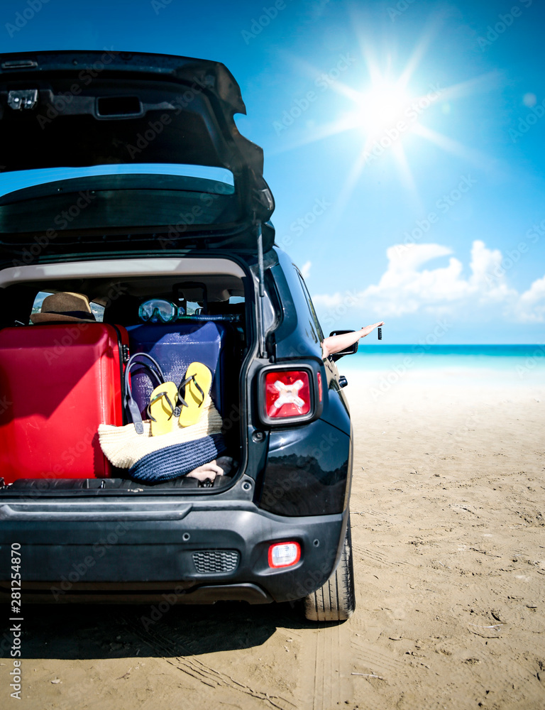 Black summer car on beautiful sunny beach. Summer journey and stopover ...