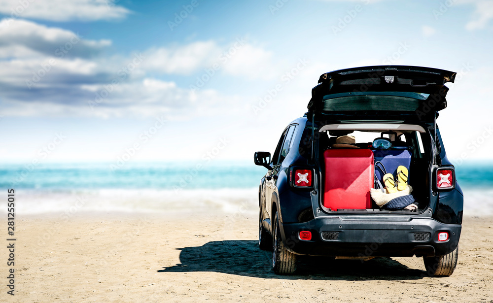 Black summer car on beautiful sunny beach. Summer journey and stopover ...