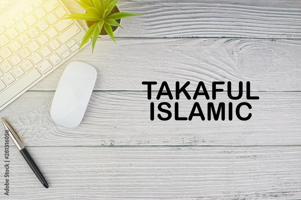 Flat lay, top view office table desk. Workspace with TAKAFUL ISLAMIC or ...