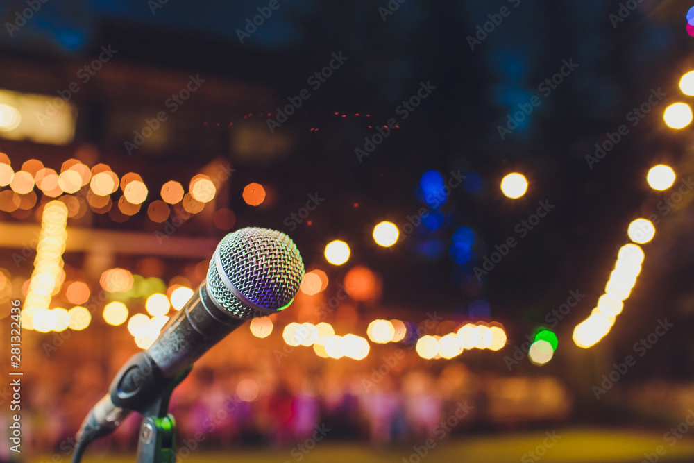 Microphone on stage for opening ceremony and performances. Blurring the ...
