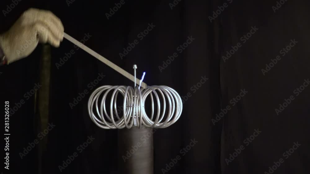 Video Stock Current line coil sparkles rumble thunder random. man hand ...