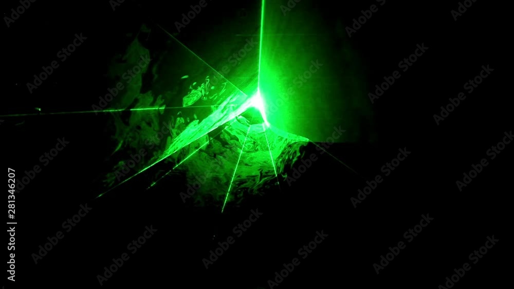 Laser Lights Hologram Show shows some colored laser rays flashing in ...