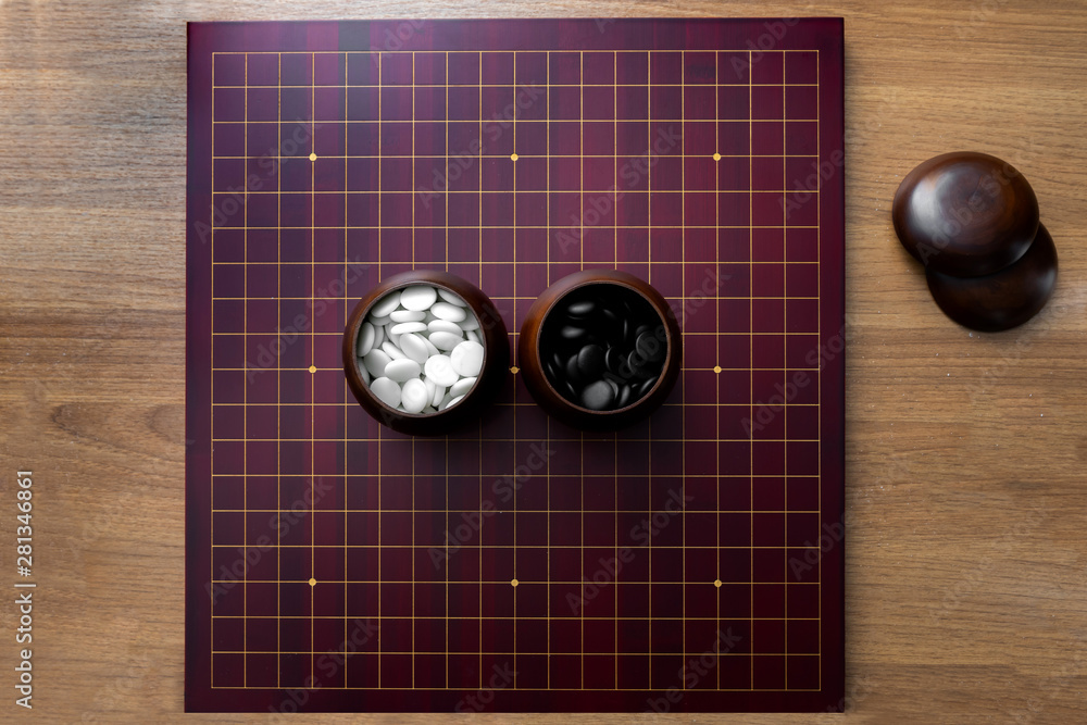 board game 'iGO' - strategy board game with black and white stone Stock ...