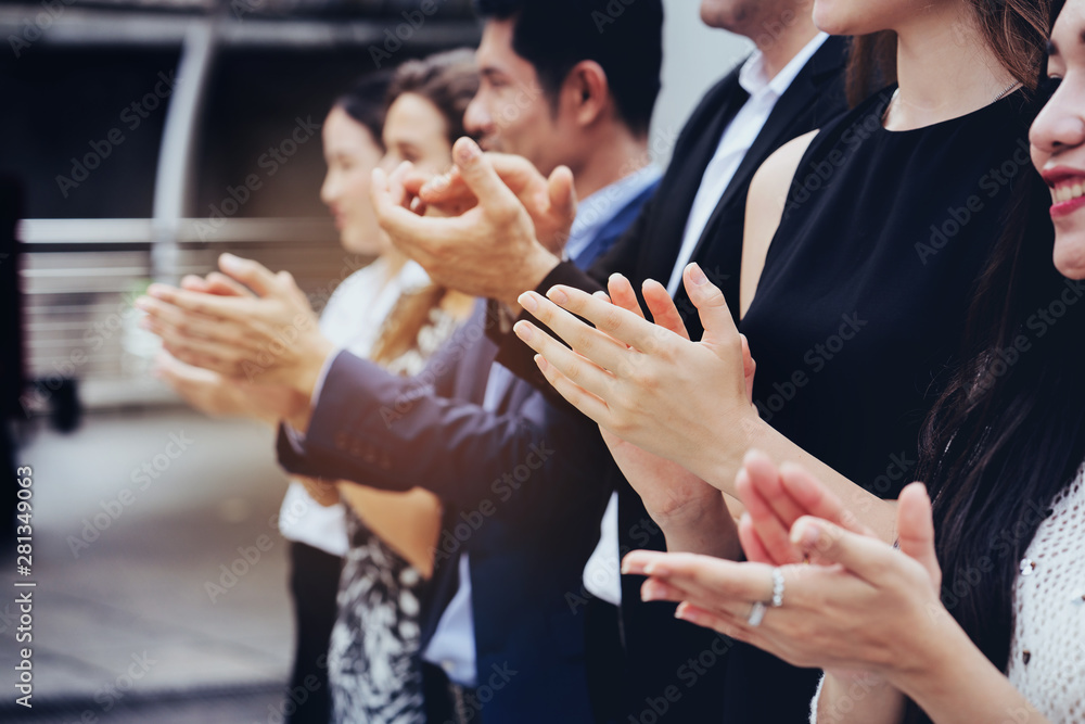 Team businessmen are clapping their hands to Congratulation the project ...