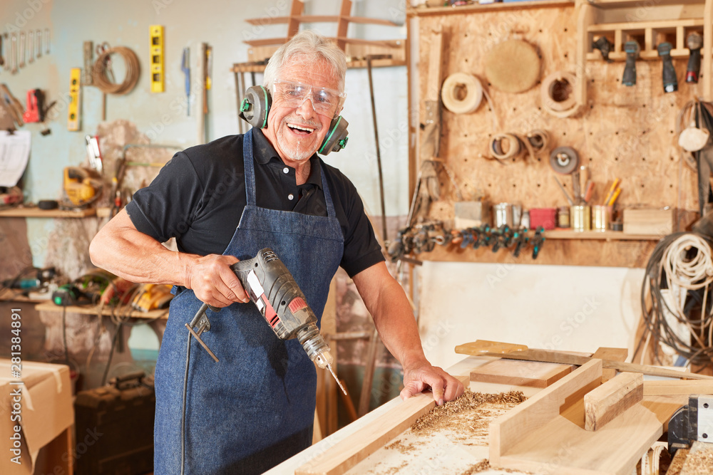 Carpenter master in woodwork Stock Photo | Adobe Stock