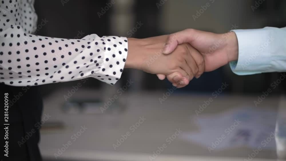 Close up of man and woman shaking hands to each other Stock Video ...