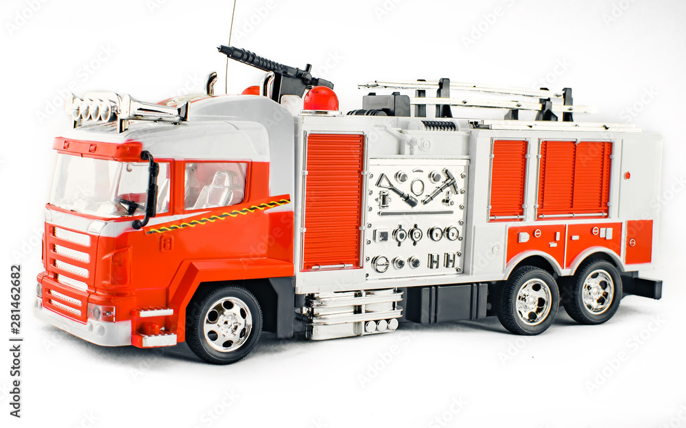 Toy fire engine with fire hose and fire extinguishing tools. Children's ...