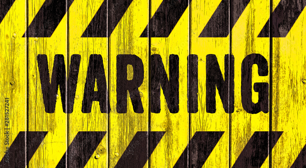Warning danger sign word text as stencil with yellow and black stripes ...