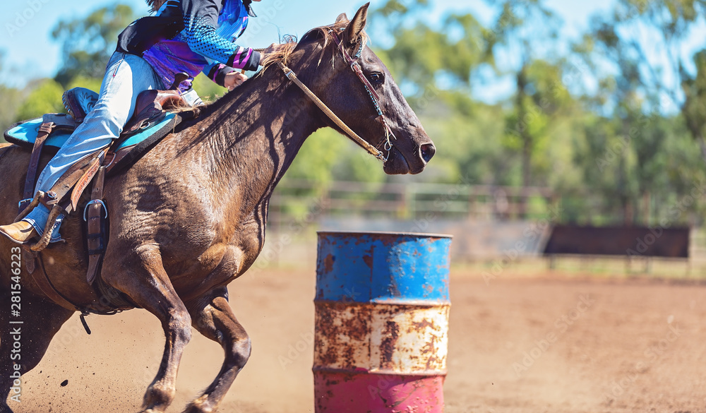 Horse And Rider Competing In Barrel Race At Outback Country Rodeo Stock ...